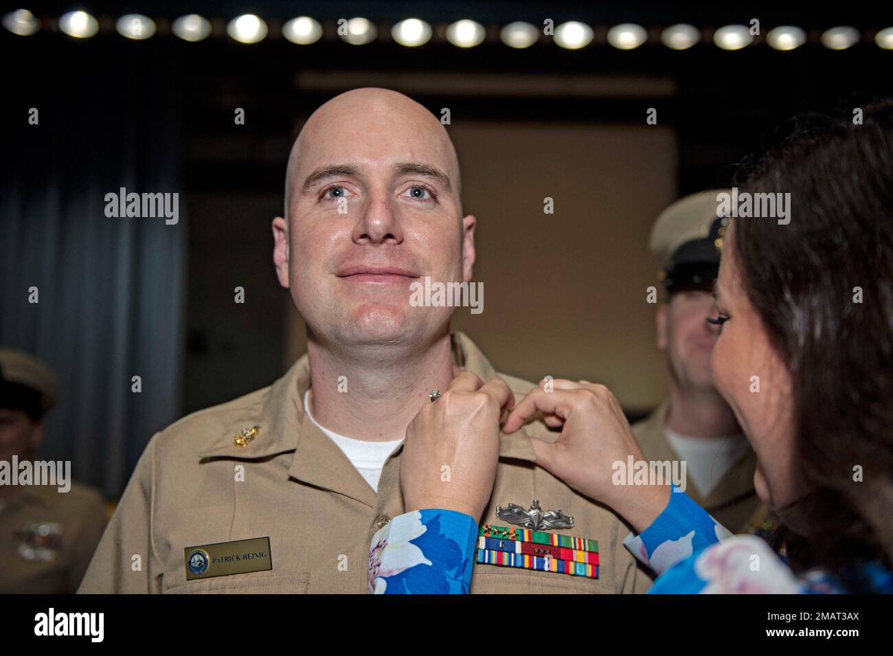 Senior Chief Machinist’s Mate (Nuclear) Patrick Heinig is pinned by his ...