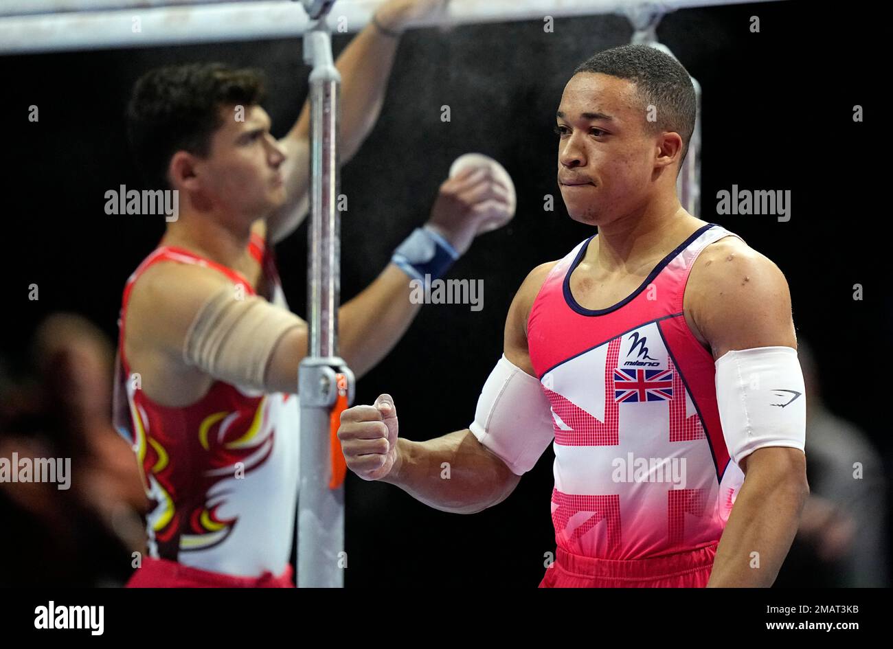 Britain's Joe Fraser reacts after winning the men's parallel bars final ...