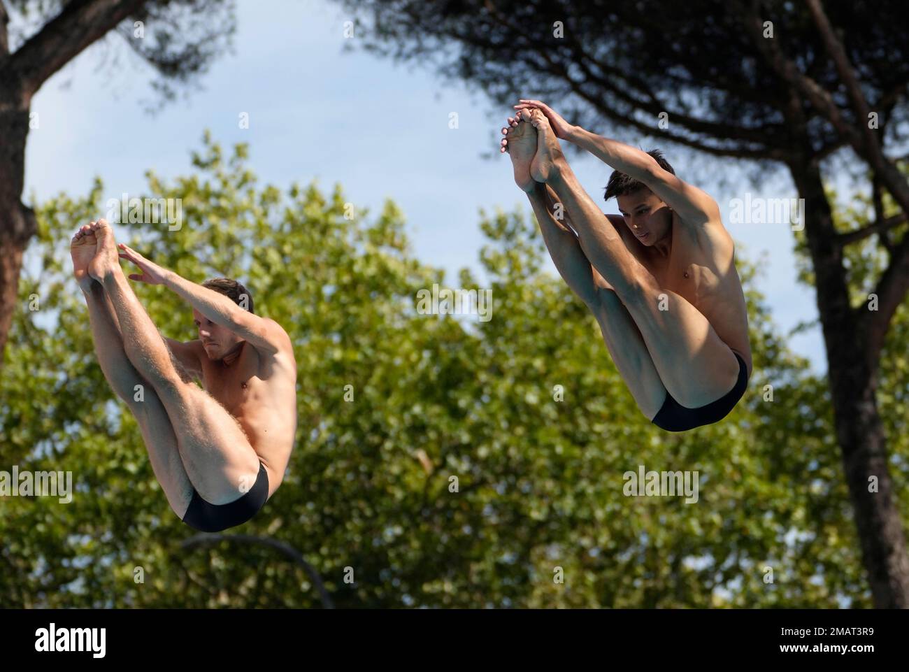 Guillame Dutoit and Jonathan Suckov of Switzerland dives during ...