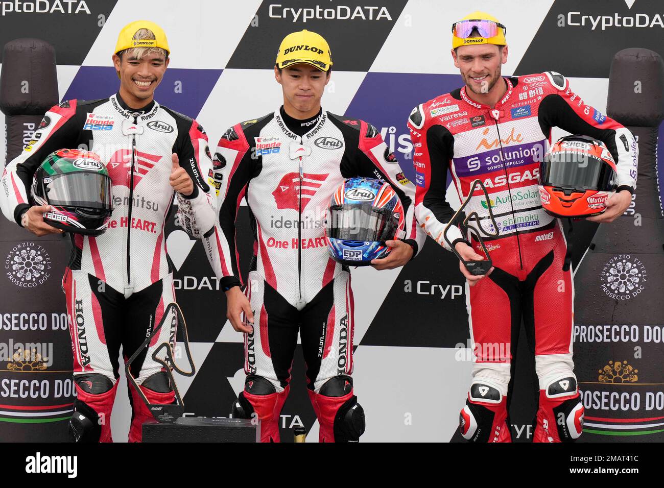 Winner Japan's rider Ai Ogura of the Idemitsu Honda Team Asia , center ...