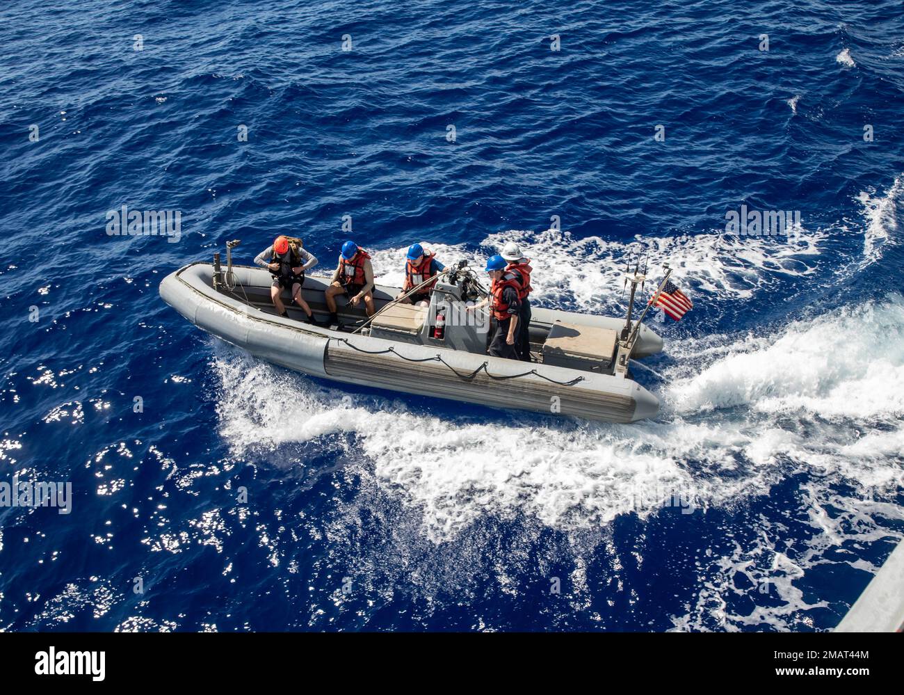 PHILIPPINE SEA (June 3, 2022) Sailors in a rigid-hull inflatable boat ...