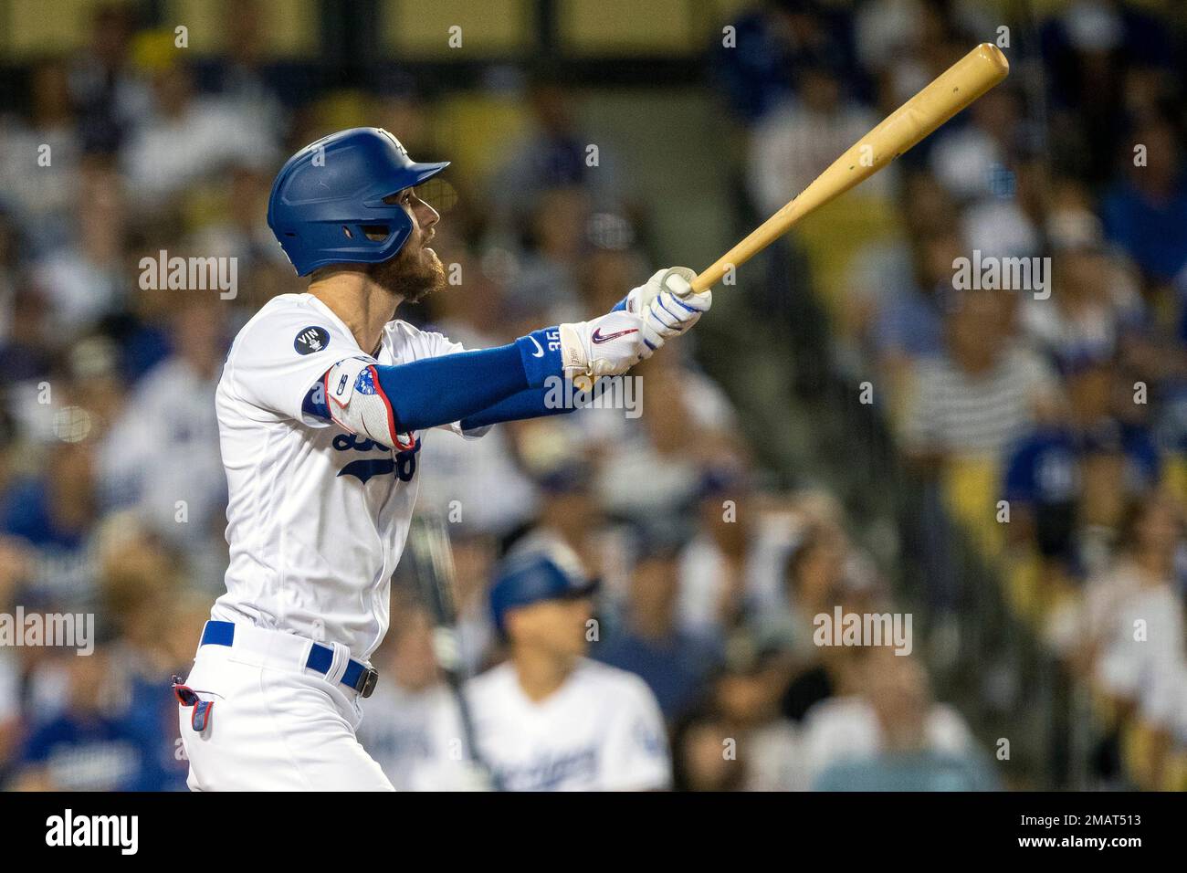 Los Angeles Dodgers' Cody Bellinger watches as he follows through to ...