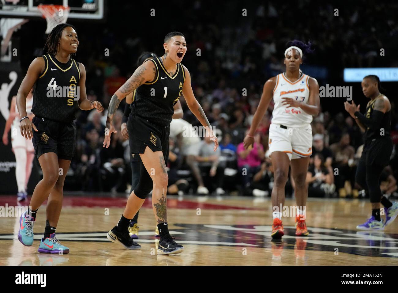 Las Vegas Aces guard Kierstan Bell (1) celebrates after a play against ...