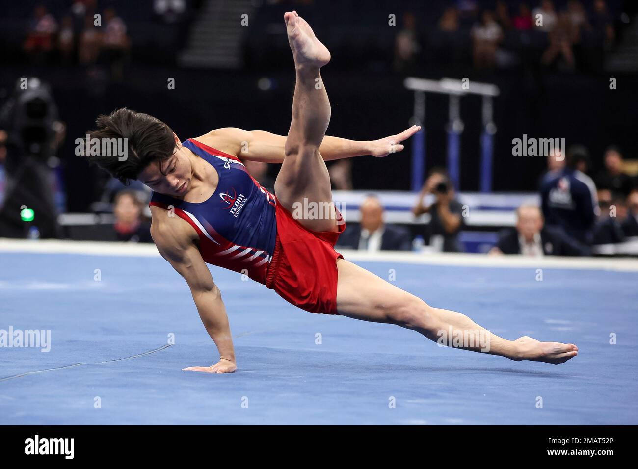 Asher Hong competes on the floor during the U.S. Gymnastics ...