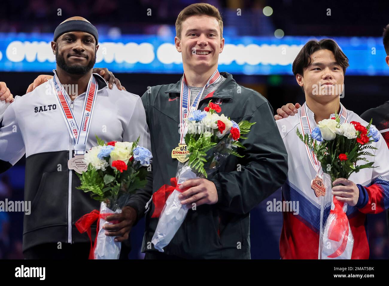 The top three overall gymnasts, from left, second place Donnell ...