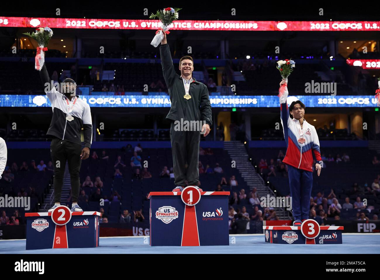 The top three overall gymnasts, from left to right, second-place ...