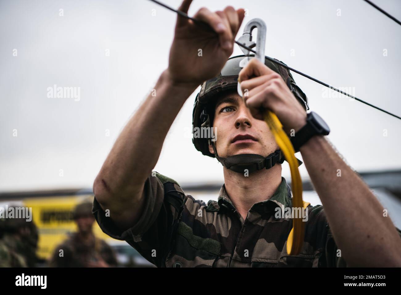 A French Army paratrooper hooks up his static line during sustained ...