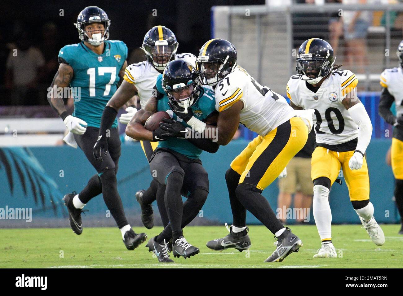 Pittsburgh Steelers linebacker Myles Jack (51) tackles Jacksonville Jaguars wide receiver ...