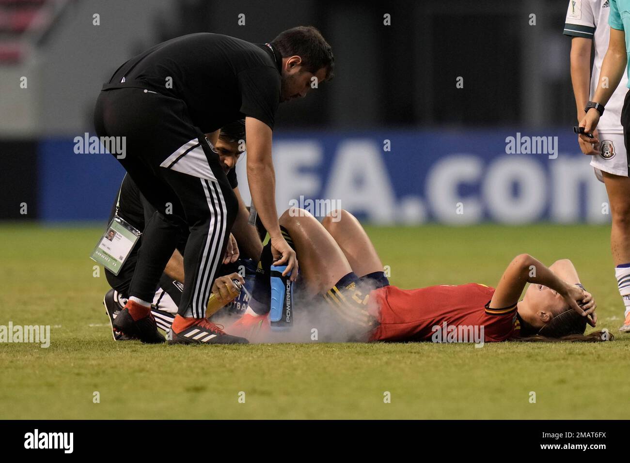 Spain's Andrea Medina receives medical assistance during a Women's ...
