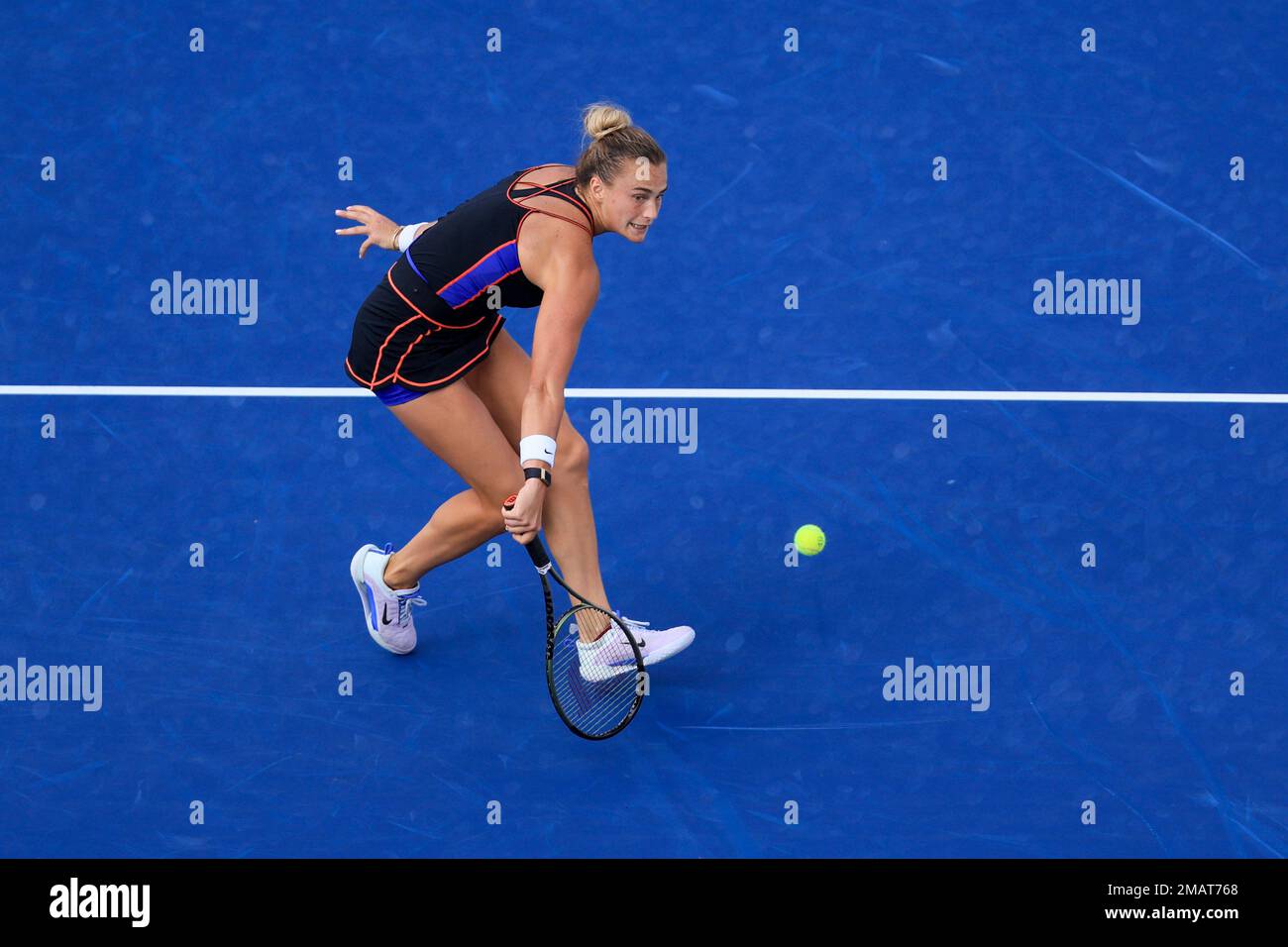 Aryna Sabalenka, of Belarus, returns a shot to Caroline Garcia, of ...