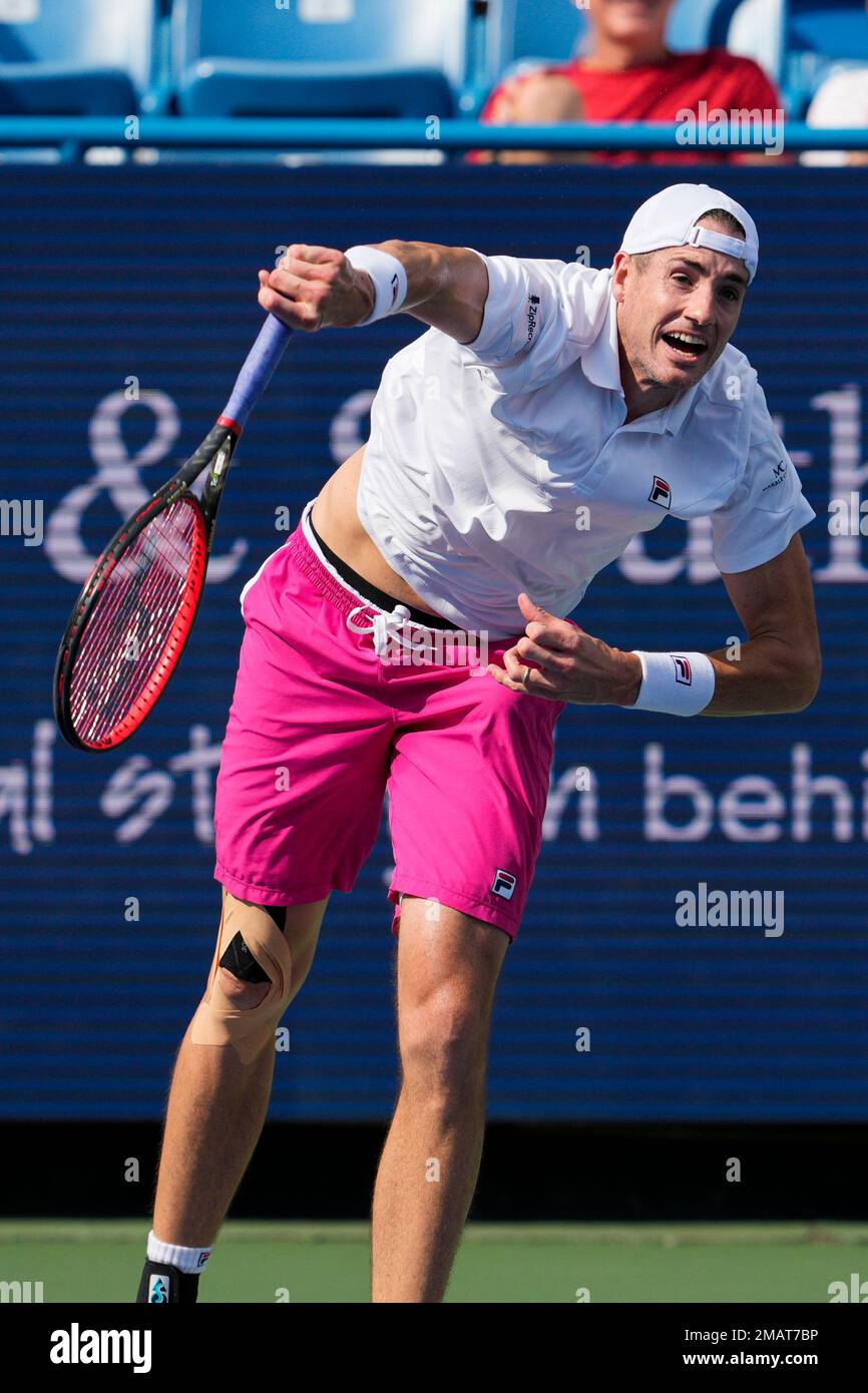 John Isner, of the United States, plays during the Western & Southern ...