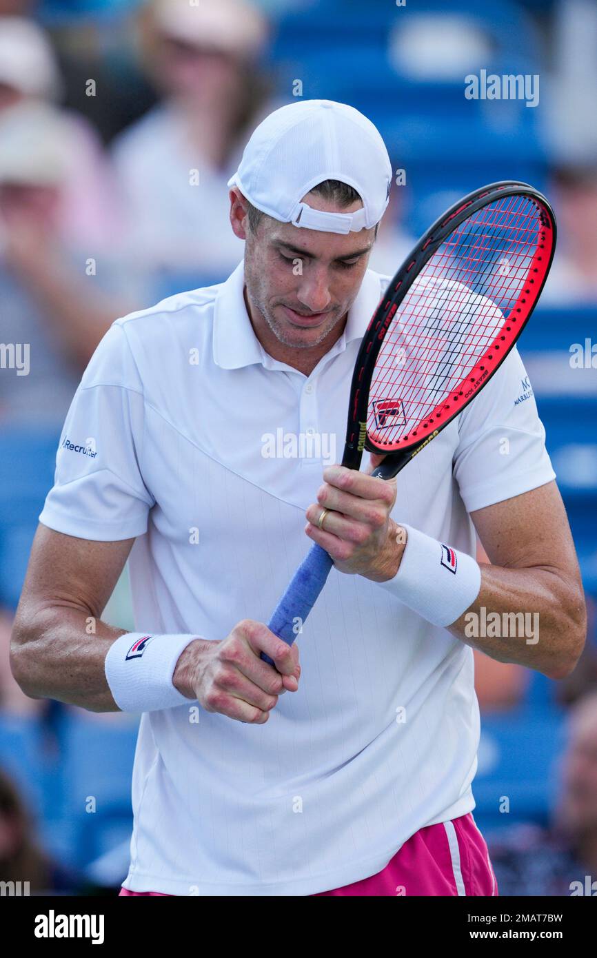 John Isner, of the United States, plays during the Western & Southern ...