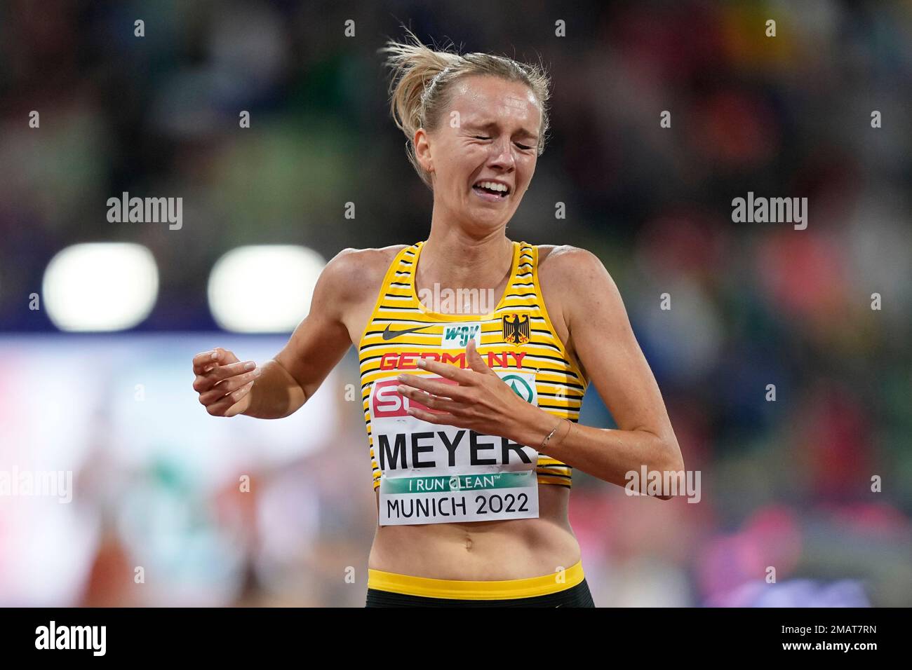 Lea Meyer, of Germany, reacts as she crosses the finish line to win the ...
