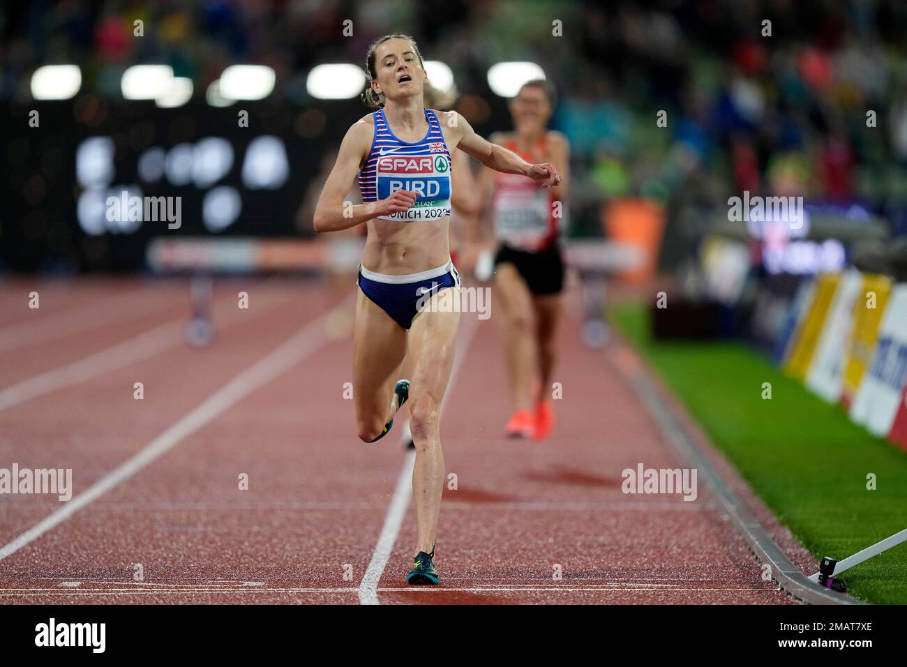 Elizabeth Bird, of Great Britain, crosses the finish line to win the ...