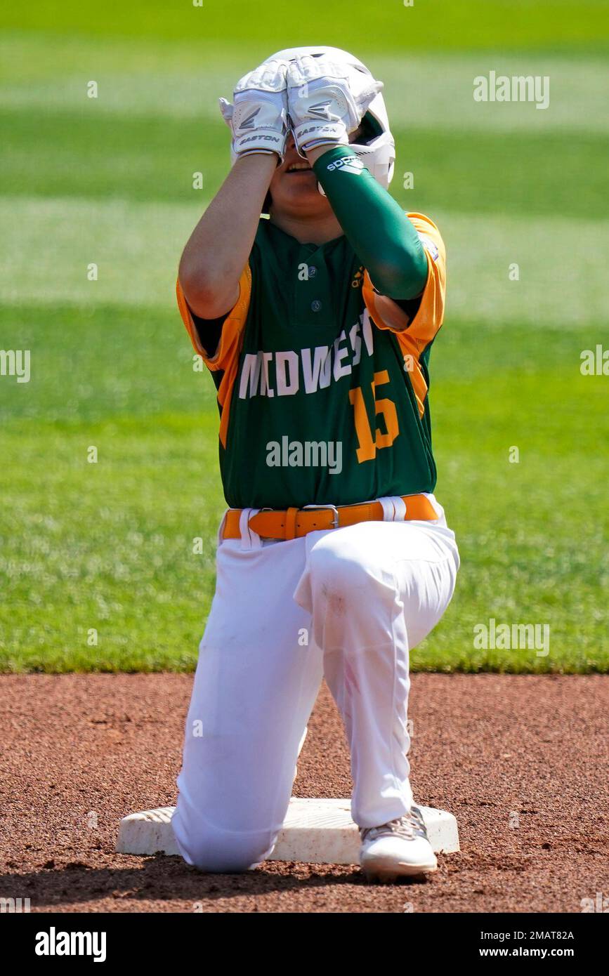 Davenport, Iowa's Theodore Swanson (15) celebrates after reaching ...