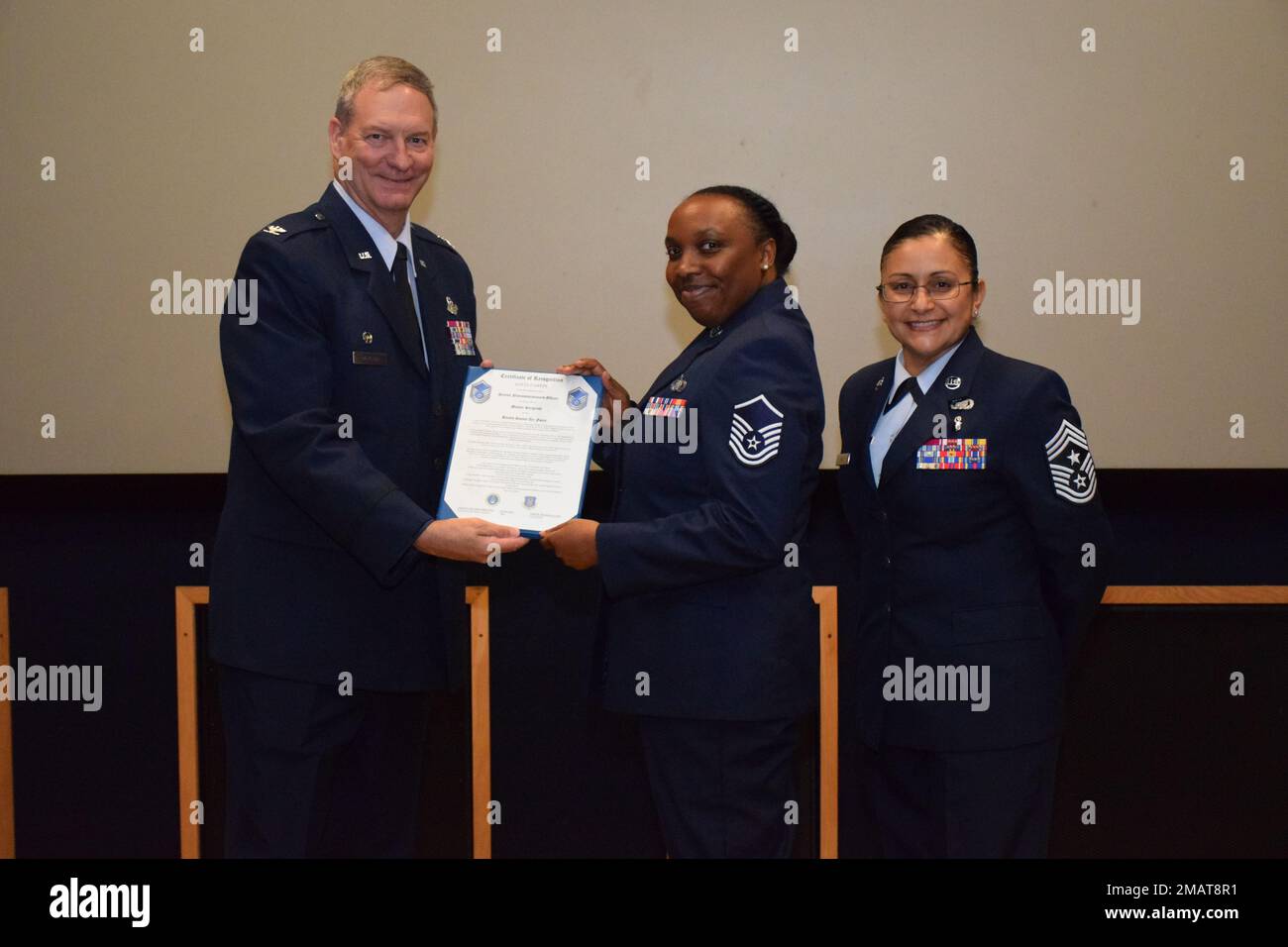 Master Sgt. Alicia Garvin, 433rd Force Support Squadron, receives a ...
