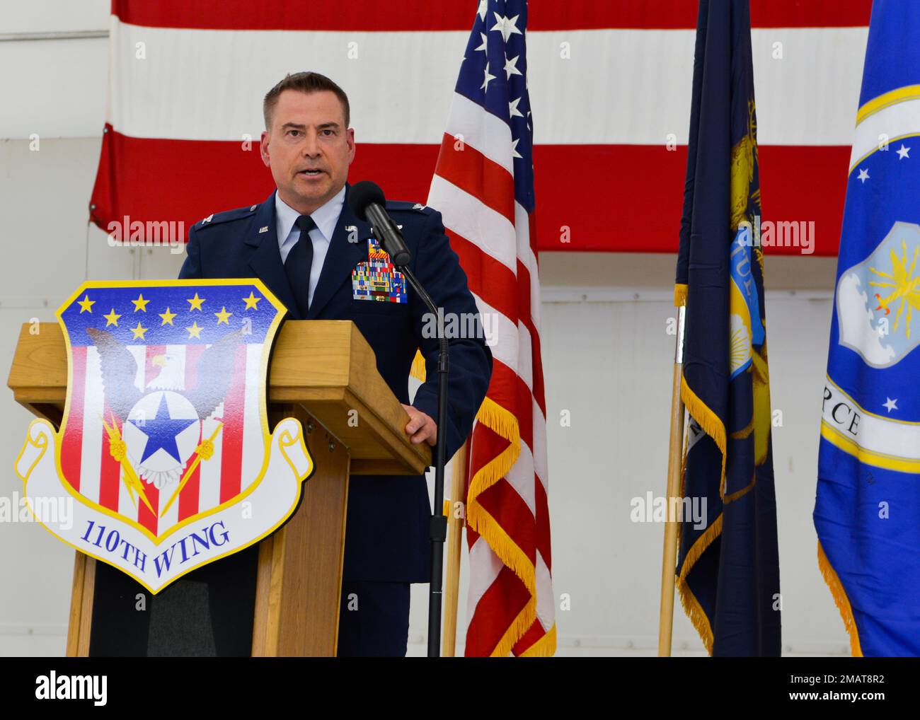 Col. Shawn E. Holtz, former 110th Wing commander, speaks during a 110th ...