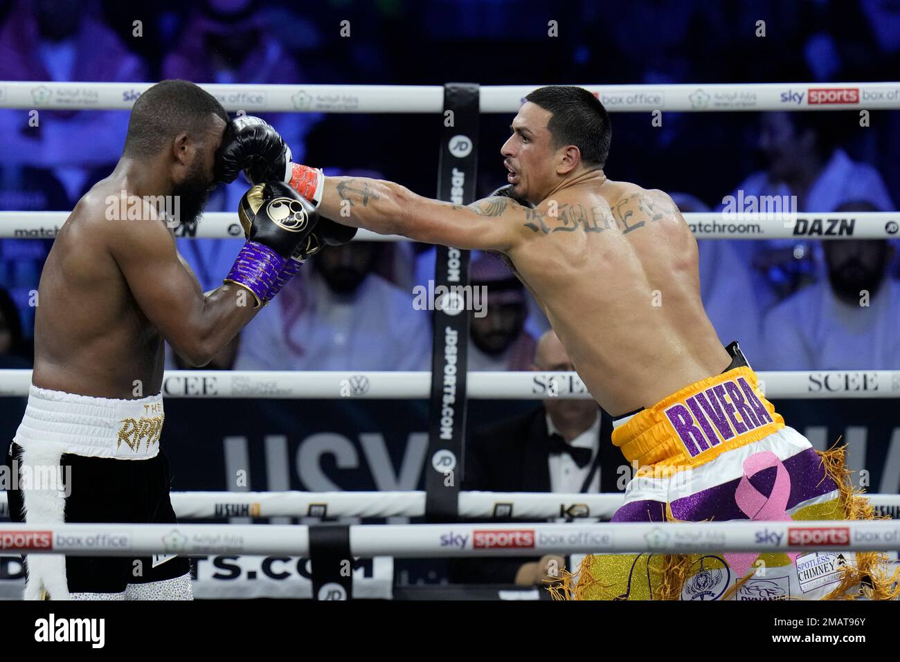 Sweden's Badou Jack, left, takes a blow from Richard Rivera of the ...