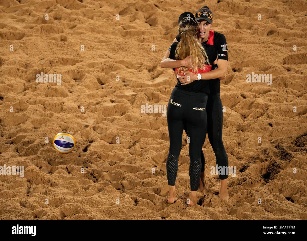 Switzerland's Tanja Huberli and Nina Brunner celebrate winning a point ...