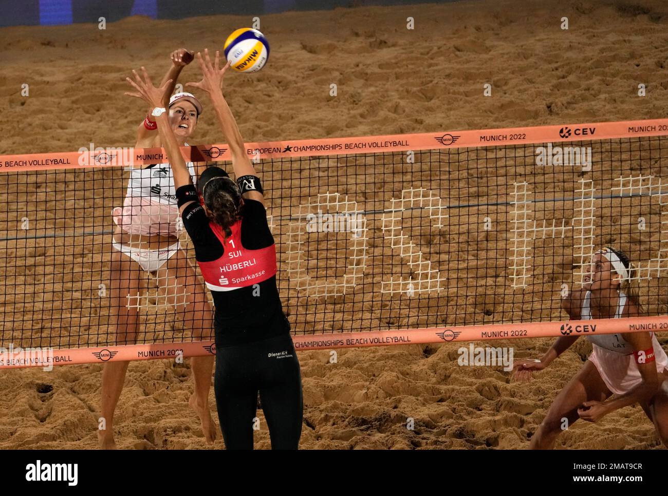 Switzerland's Tanja Huberli tries to block Latvia's Tina Graudina and ...
