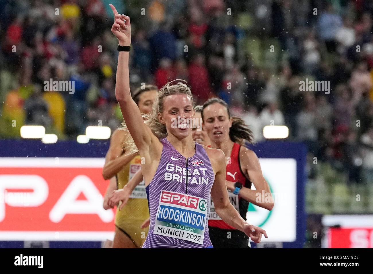 Keely Hodgkinson, of Great Britain, crosses the finish line to win the ...