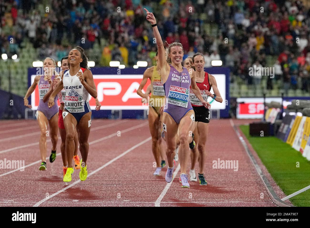 Keely Hodgkinson, of Great Britain, crosses the finish line to win the ...