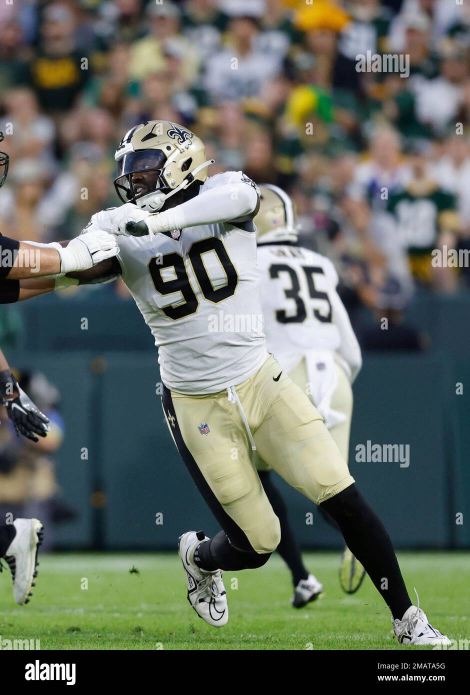New Orleans Saints defensive end Tanoh Kpassagnon (90) plays defense ...
