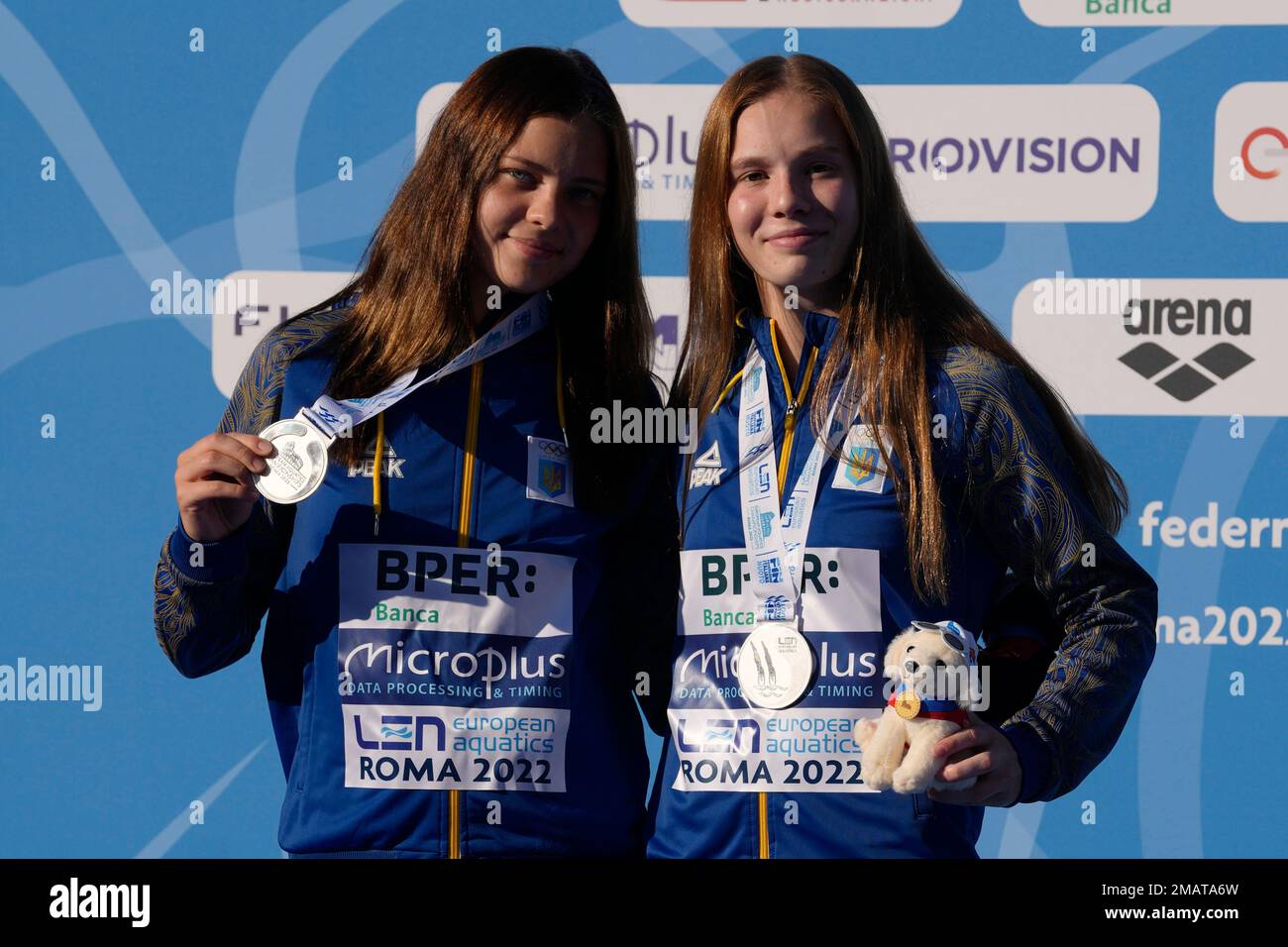 Kseniia Bailo and Sofiia Lyskun of Ukraine celebrate their silver medal ...