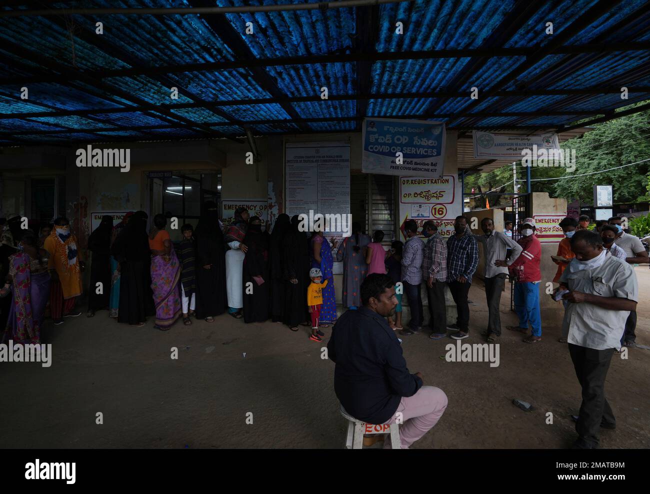 People crowd the registration counter at the Government Fever Hospital ...