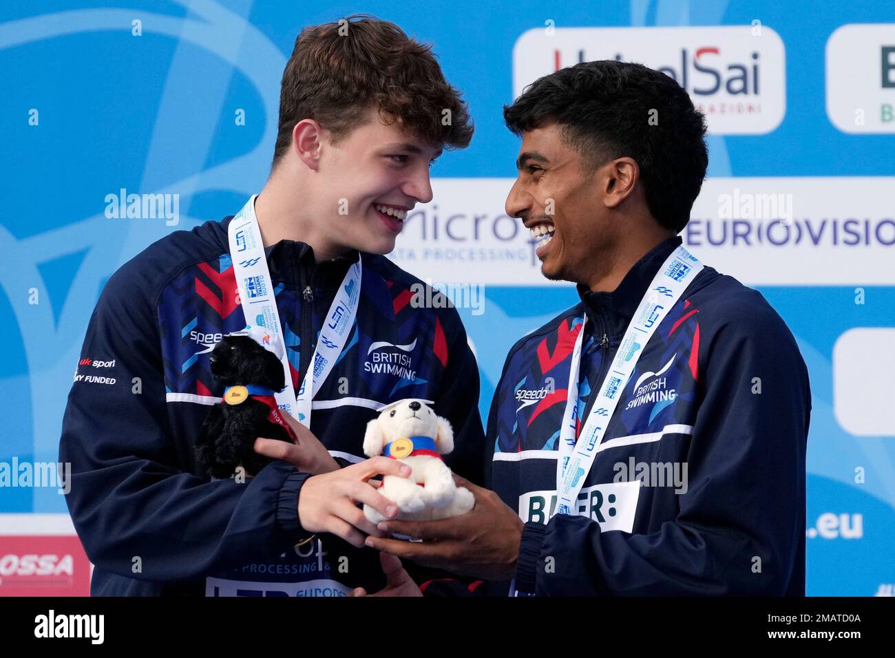 Ben Cutmore and Kyle Kothari of Britain celebrate the gold medal on the ...