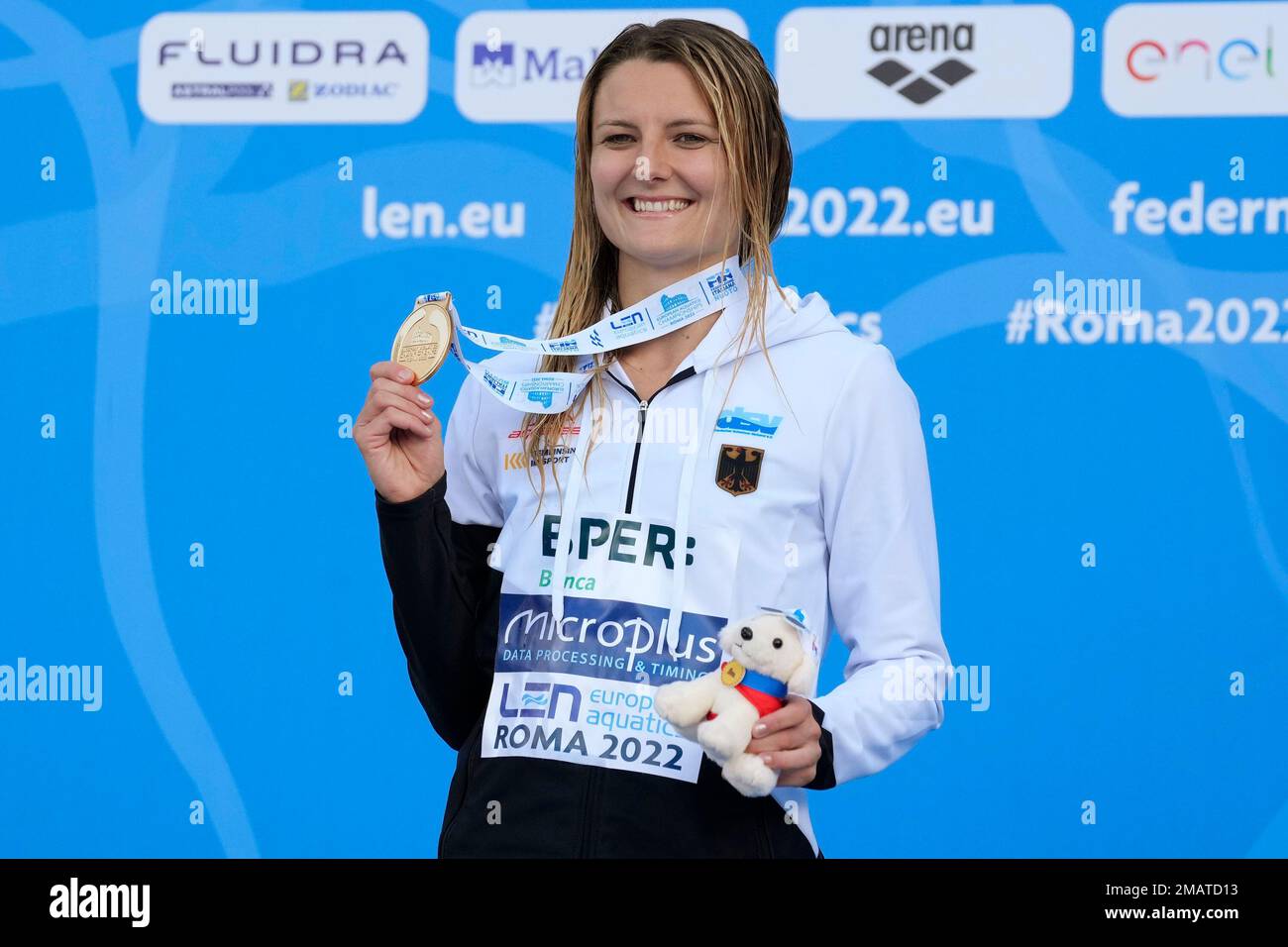 Iris Schmidbauer of Germany celebrates her gold medal on the podium of ...