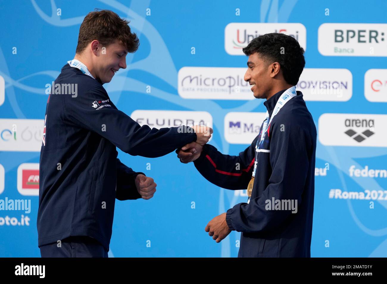 Ben Cutmore and Kyle Kothari of Britain celebrate the gold medal on the ...