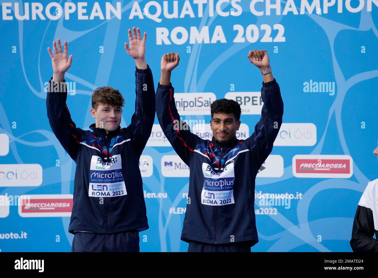 Ben Cutmore and Kyle Kothari of Britain celebrate the gold medal on the ...