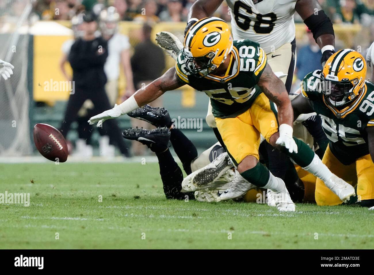 Green Bay Packers linebacker Isaiah McDuffie (58) chases down a fumble ...