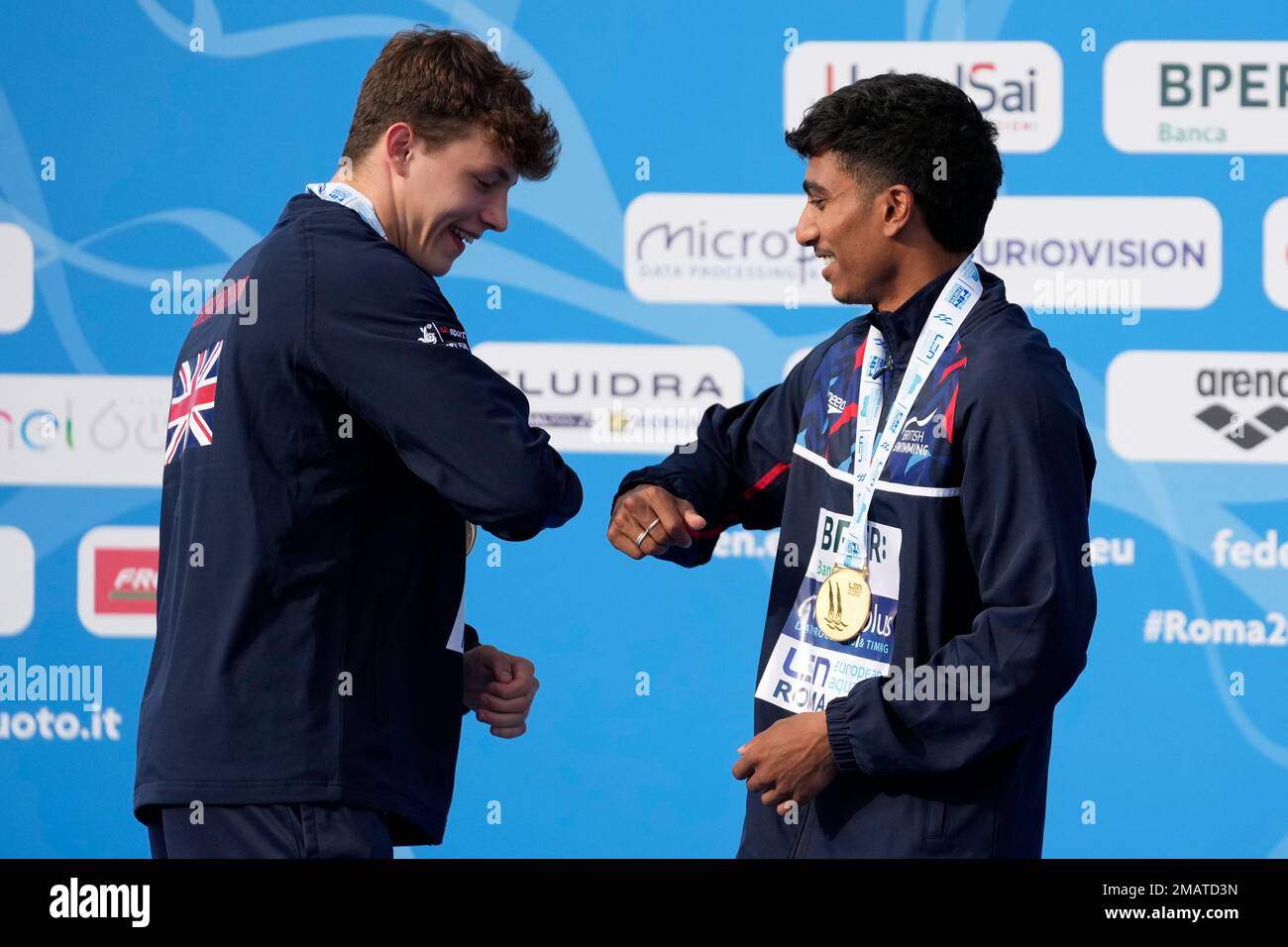 Ben Cutmore and Kyle Kothari of Britain celebrate the gold medal on the ...
