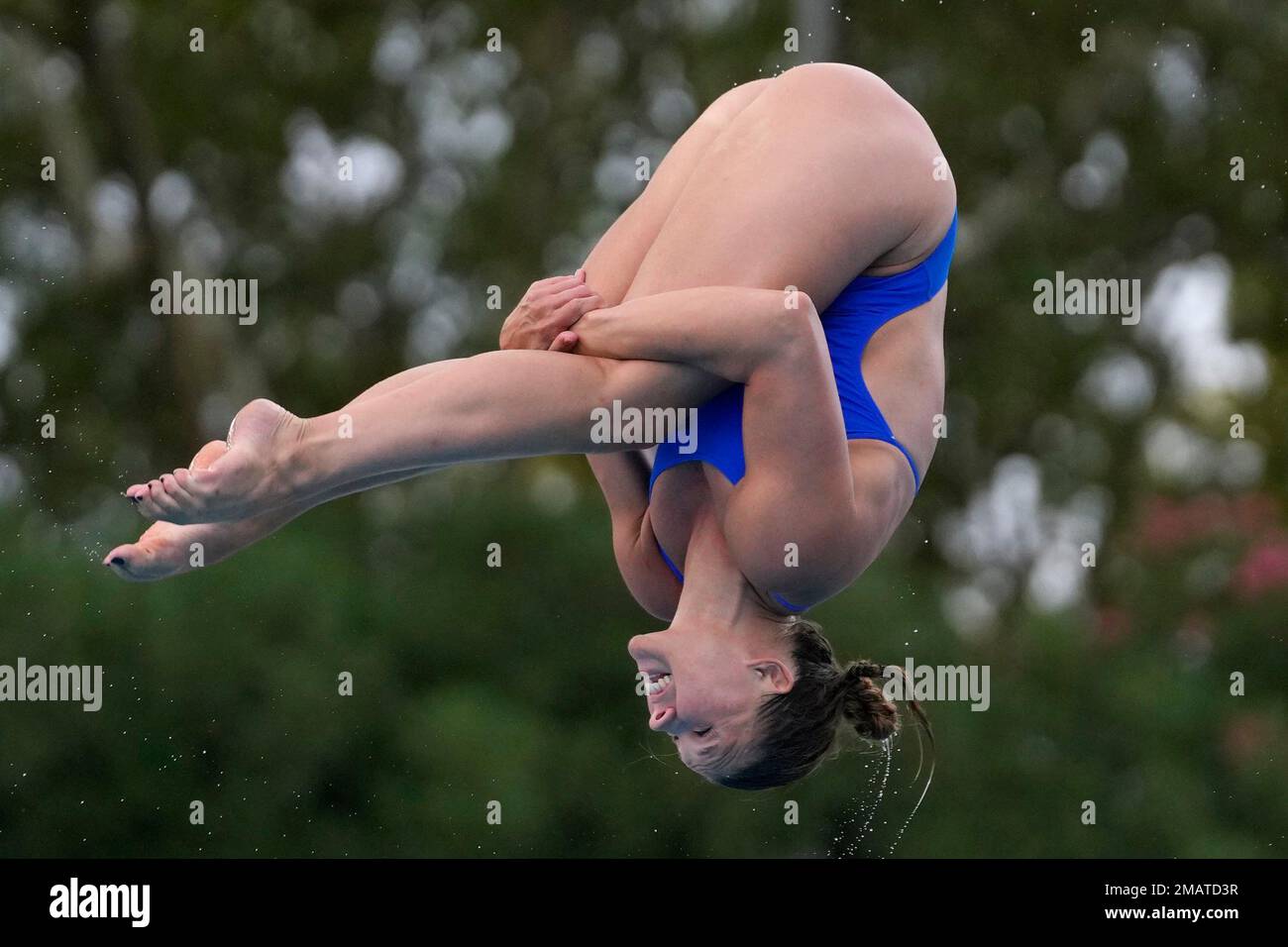 Grace Reid of Britain competes during diving Women's diving 3m ...