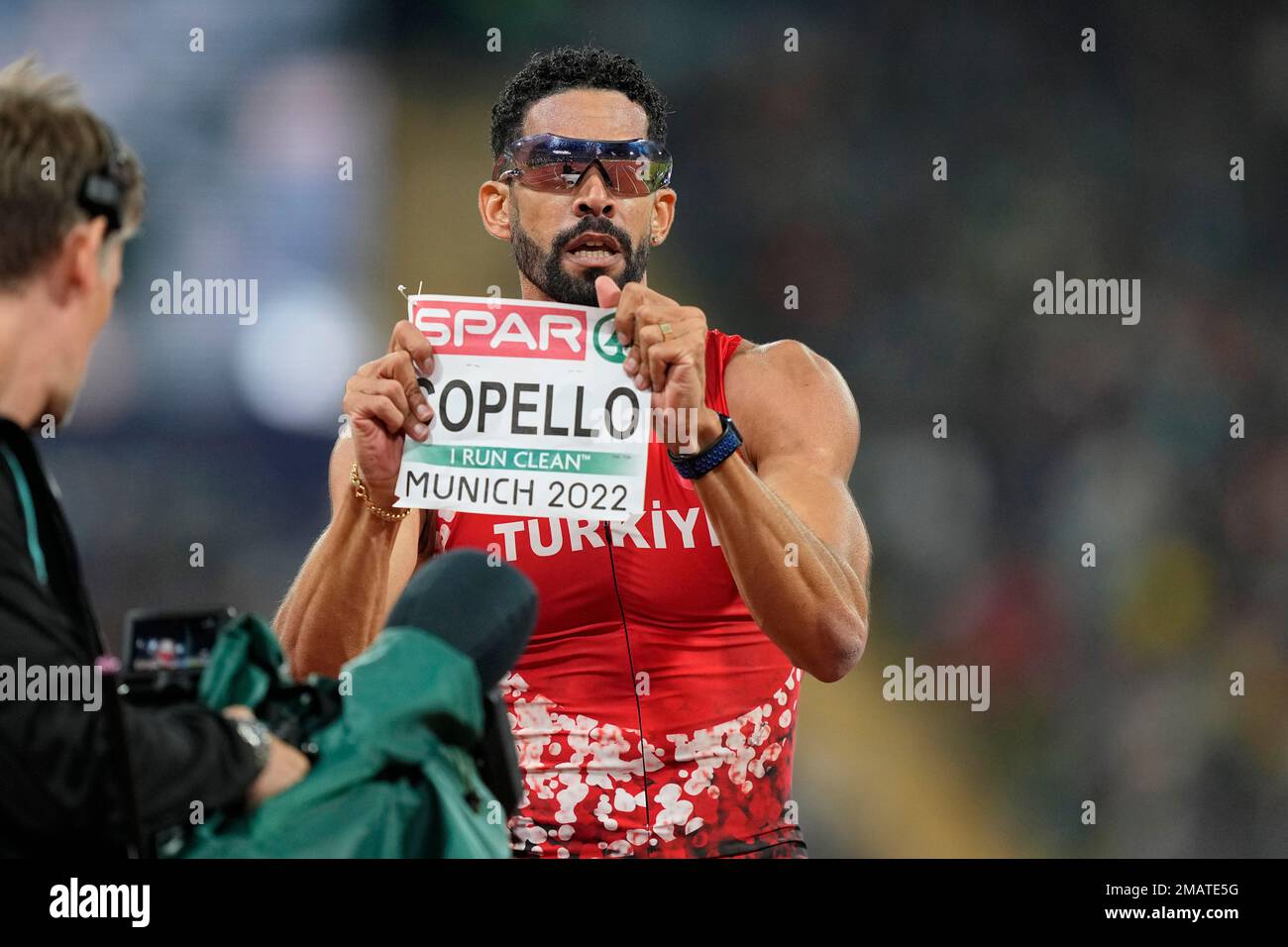 Yasmani Copello, of Turkey, celebrates after winning the bronze medal ...