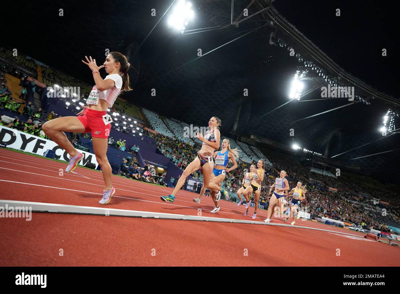 Sofia Ennaoui, of Poland, left, runsl in the Women's 1500 meters during ...