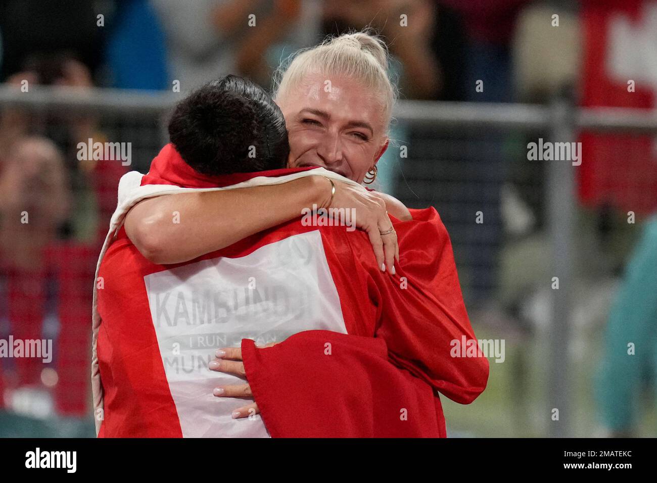 Bronze medalist Ida Karstoft, of Denmark, and gold medalist Mujinga ...