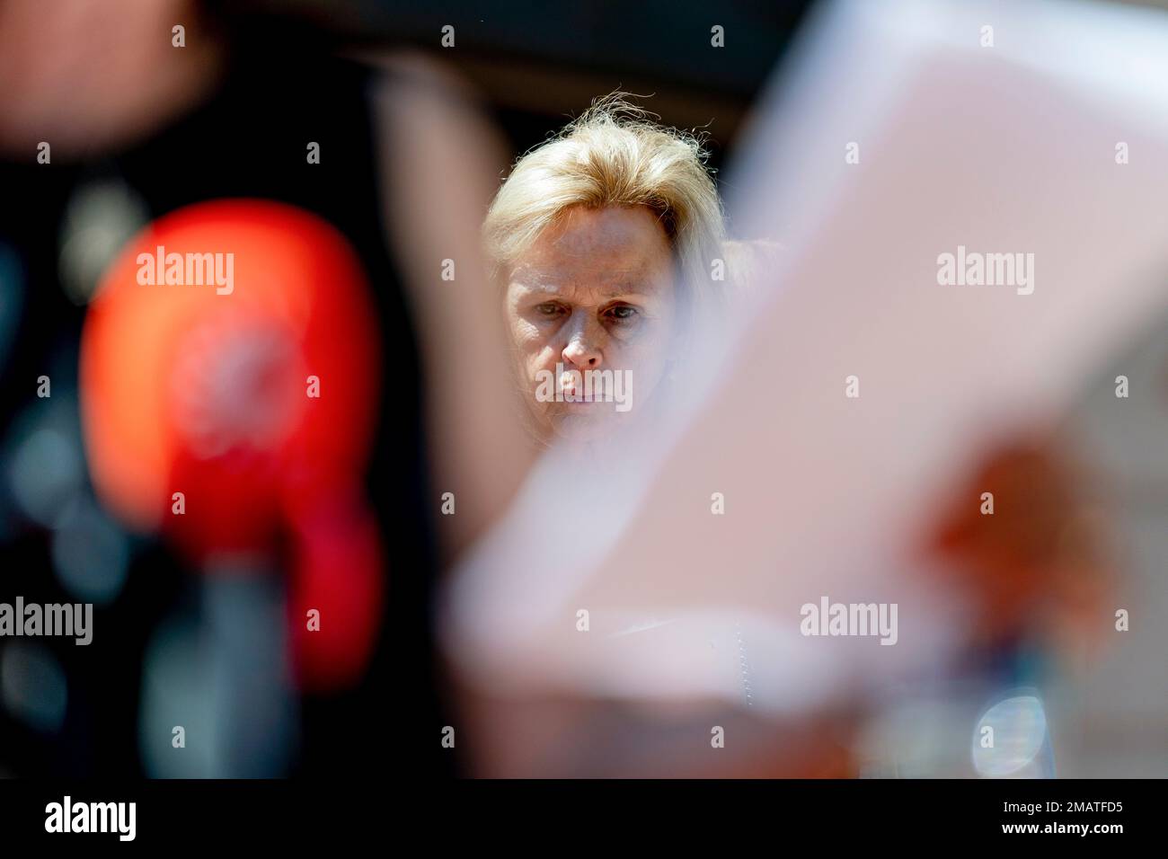 Marsha Mueller, the mother Kayla Mueller, listens as Diane Foley ...