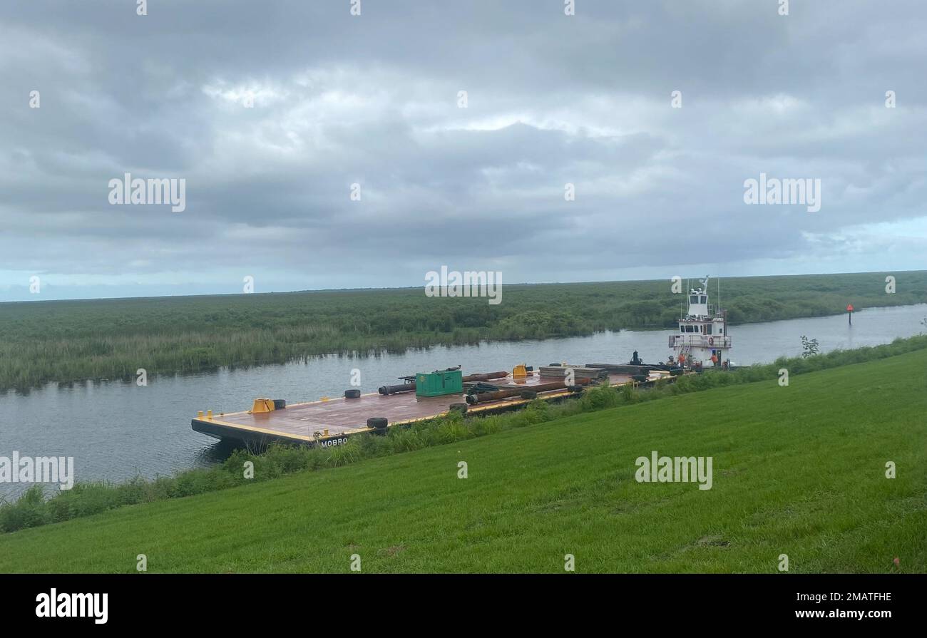 A 46-foot towing vessel, Catherine, and deck barge, Mobro 130, ran ...