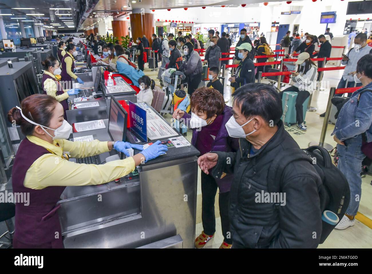 **CHINESE MAINLAND, HONG KONG, MACAU AND TAIWAN OUT** Passengers check ...