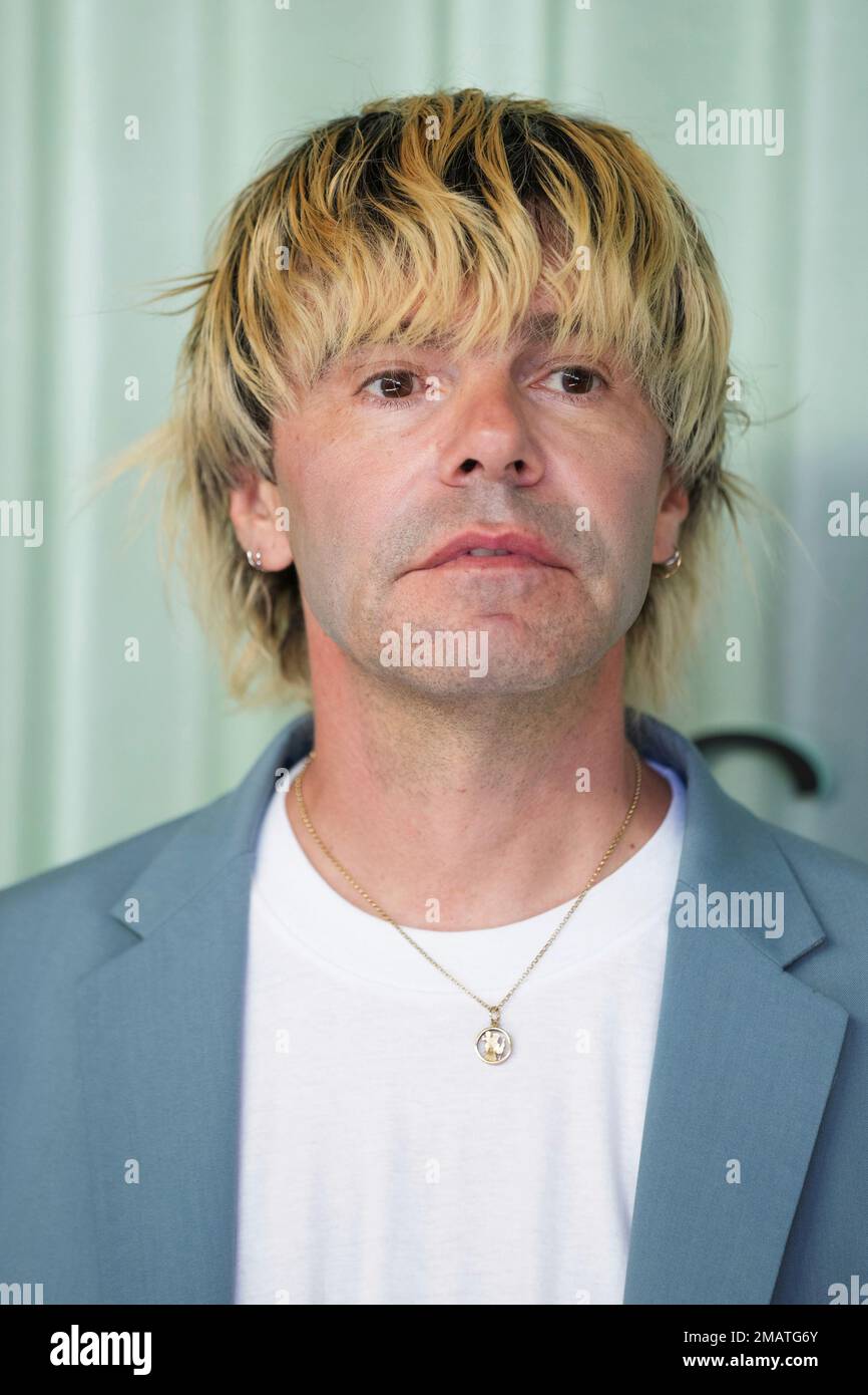 Tim Burgess poses for photographers upon arrival for the premiere of ...