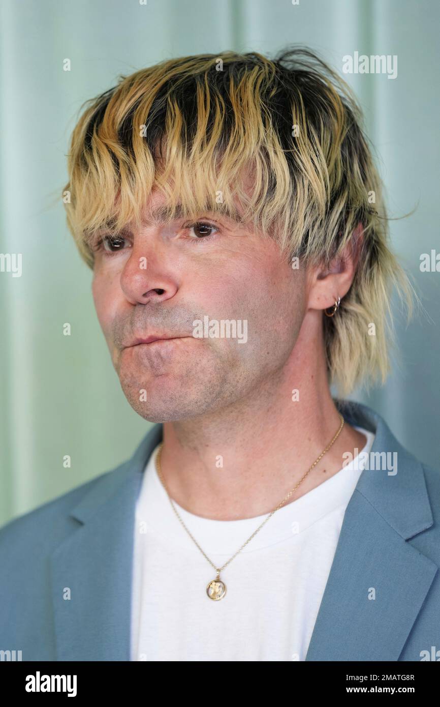 Tim Burgess poses for photographers upon arrival for the premiere of ...