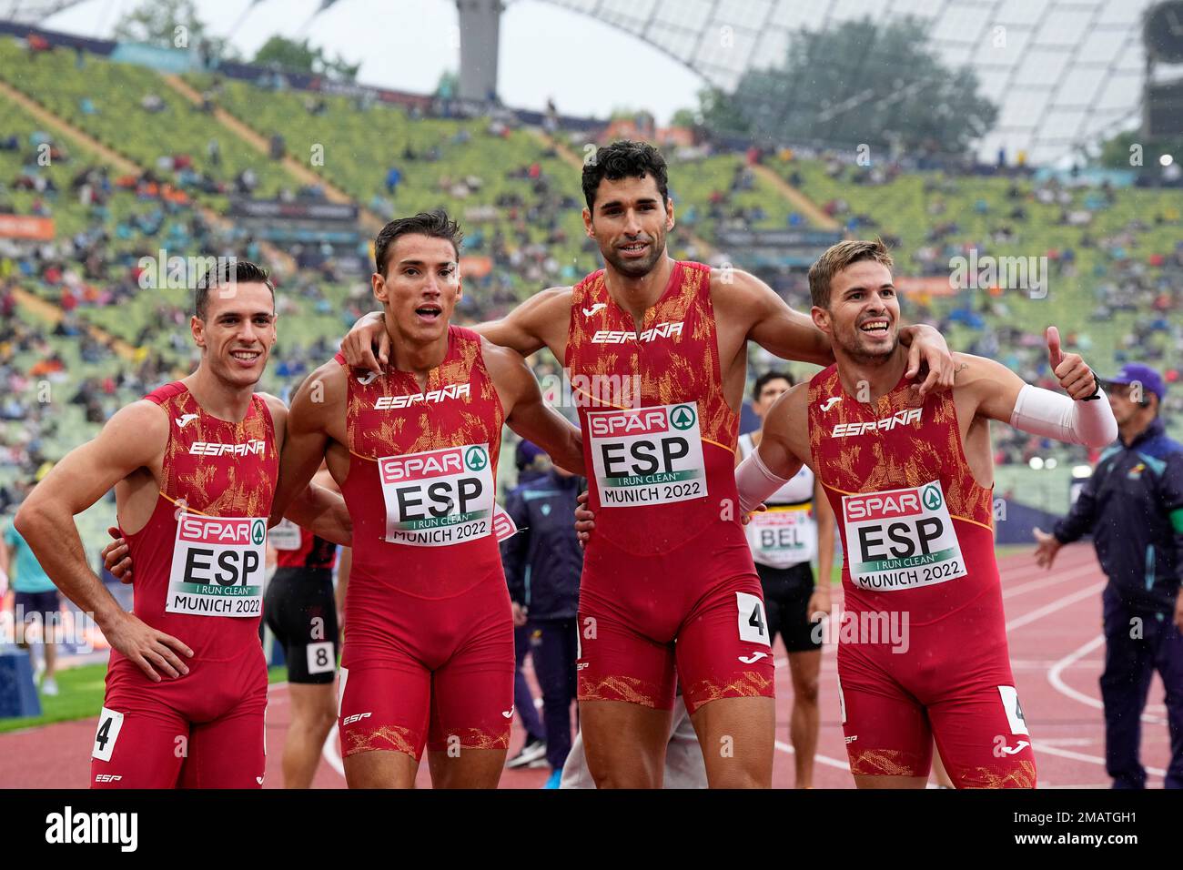 The team of Spain pose after winning their Men's 4x400 meters relay ...
