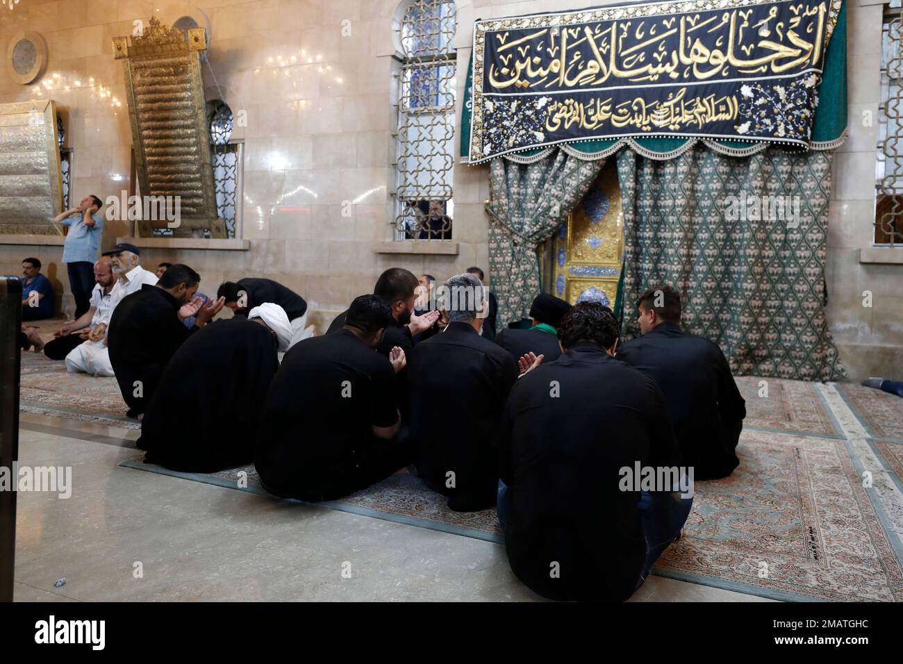 Syrian Shiites pray at Sayyidah Zaynab shrine in Damascus. Syria ...