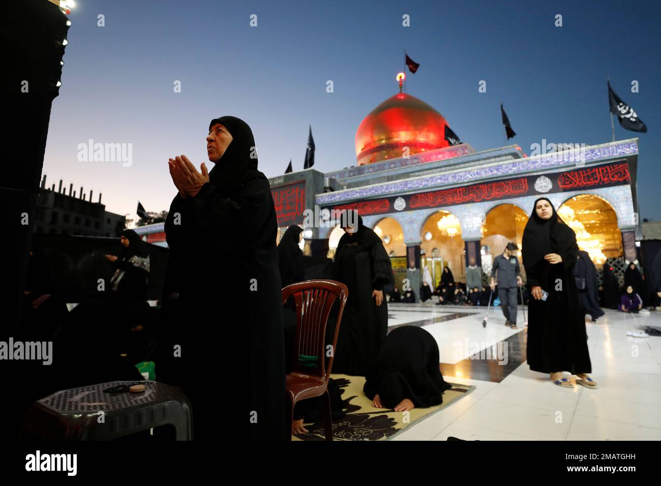 Syrian Shiites pray at Sayyidah Zaynab shrine in Damascus. Syria ...
