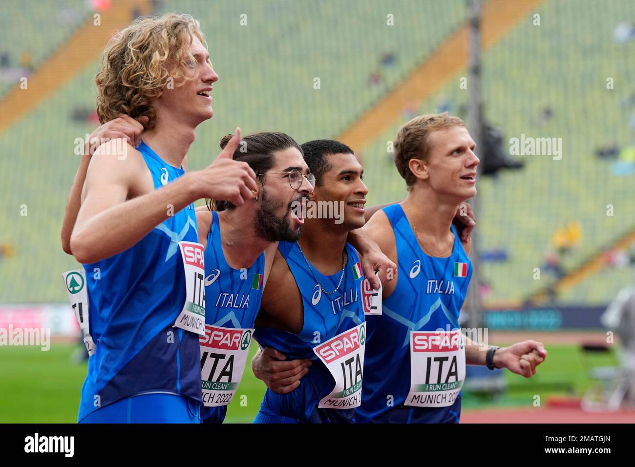 The team of Italy pose after qualifying in their Men's 4x400 meters ...