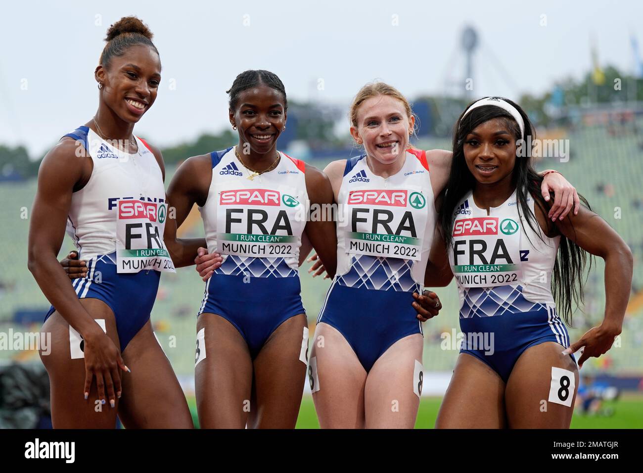 The team of France pose after winning their Women's 4x100 meters relay ...