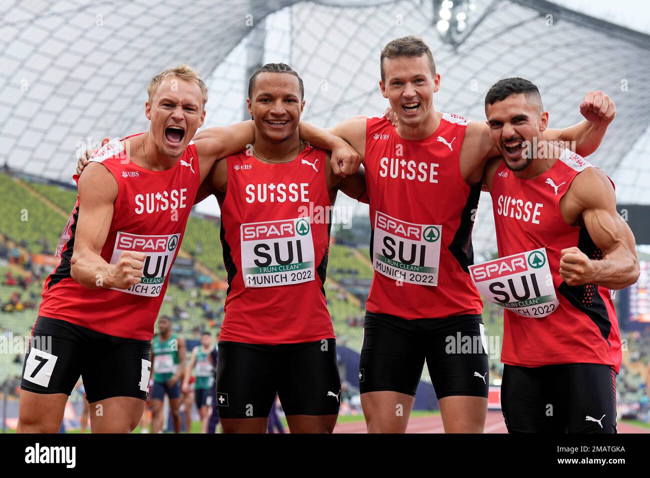 The team of Switzerland pose after finishing third in their Men's 4x100 ...